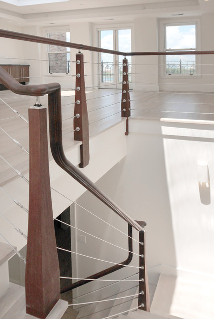 modern dark wood staircase with wire cables - Modern - Staircase ...