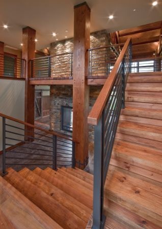 Northwest home: stairs with fireplace in entry - Contemporary ...
