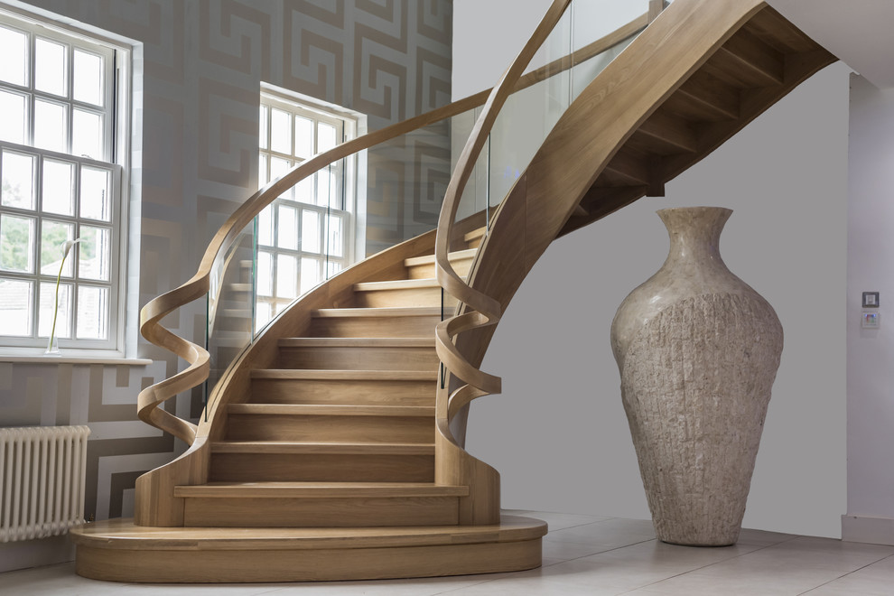 oak curved staircase with a roller coaster balustrade - Traditional ...