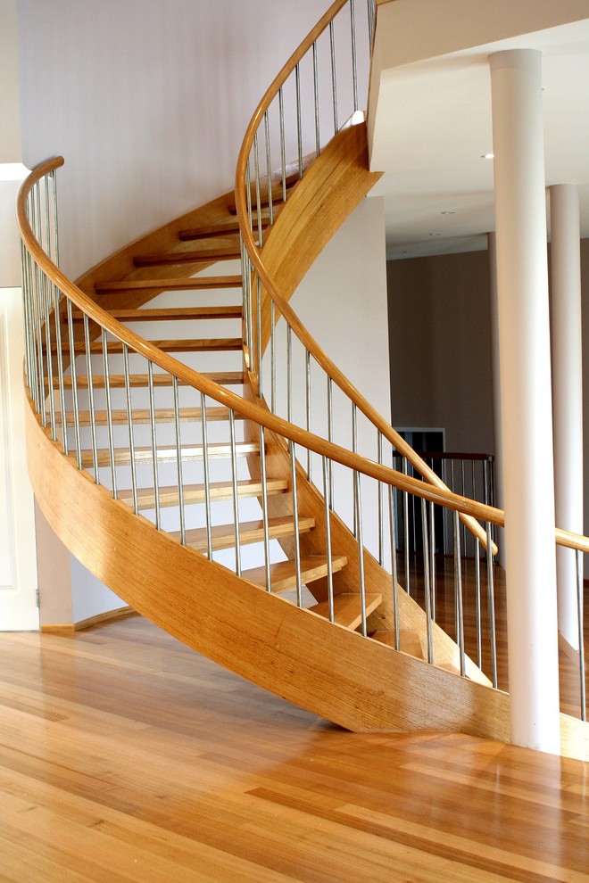 Open Curved Geometric Stair with stainless steel balusters - Staircase ...