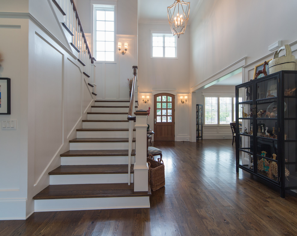 Open foyer and open staircase with wood panels. Build for the Cure 2015 ...
