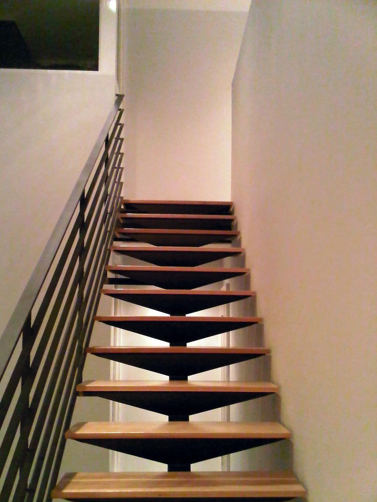 open steel staircase, floating hickory treads, blackened steel railing ...