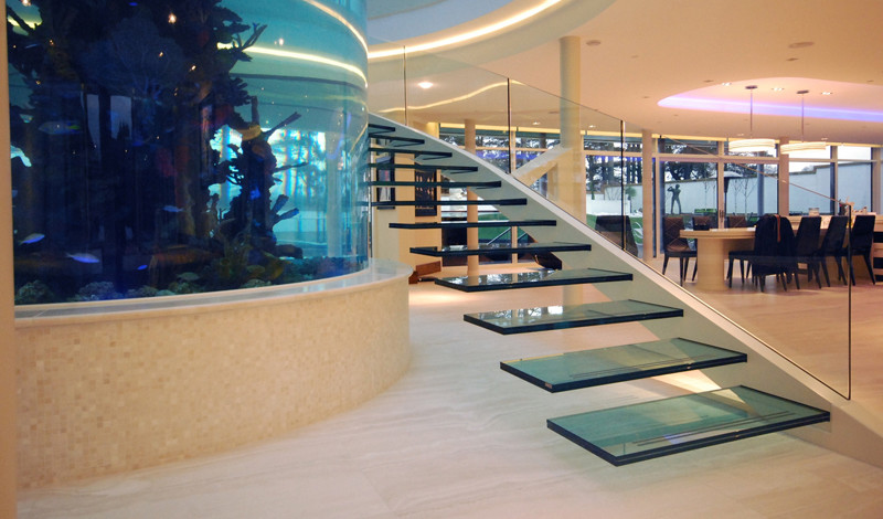 Staircase surrounding fish tank - Contemporary - Staircase - London ...