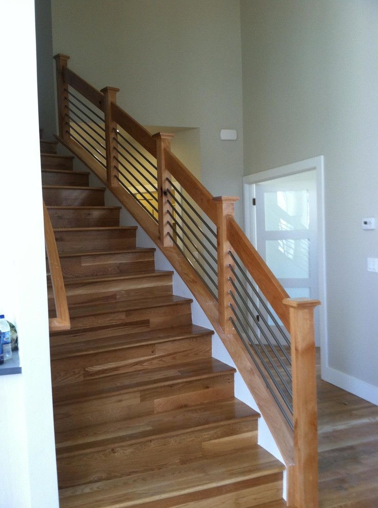 Staircase with wood flooring and cable railing - Transitional ...