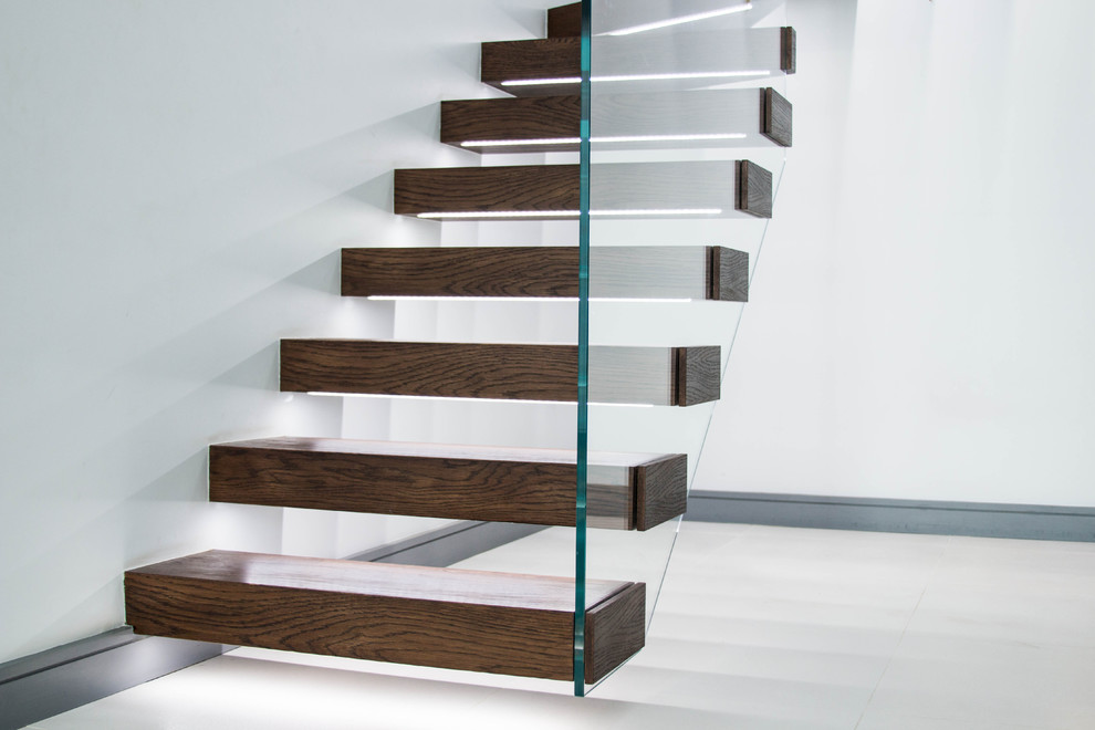 The walnut treads floating staircase with LED Lights - Modern ...