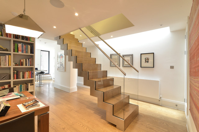 Two straight stairs with offset cantilever timber treads and glass ...
