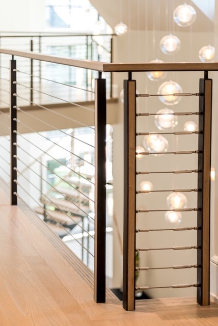 Vaddi - floating double steel center stringer with cable railing ...