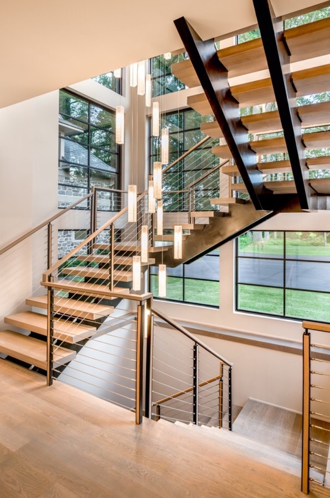 Vaddi - floating double steel center stringer with cable railing ...