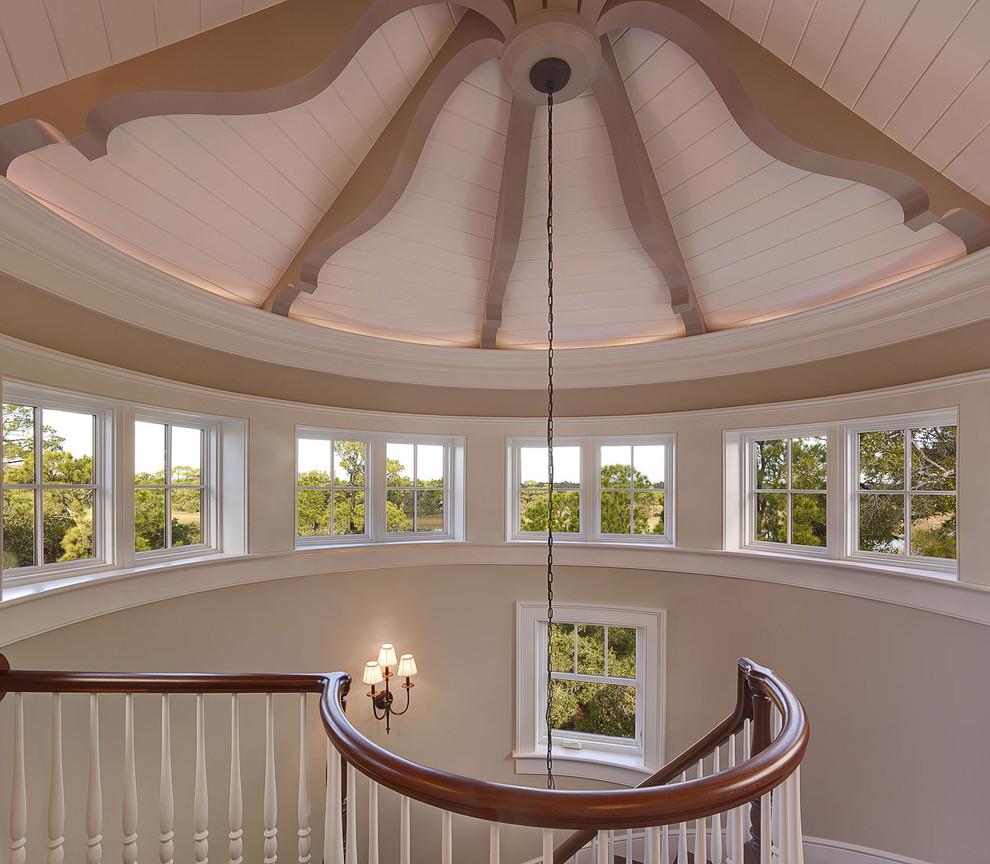 Wrap around windows and decorative beams top Stair Tower - Traditional ...