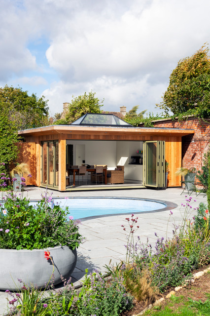 Contemporary pool house amongst a traditional setting. - Modern - Pools ...
