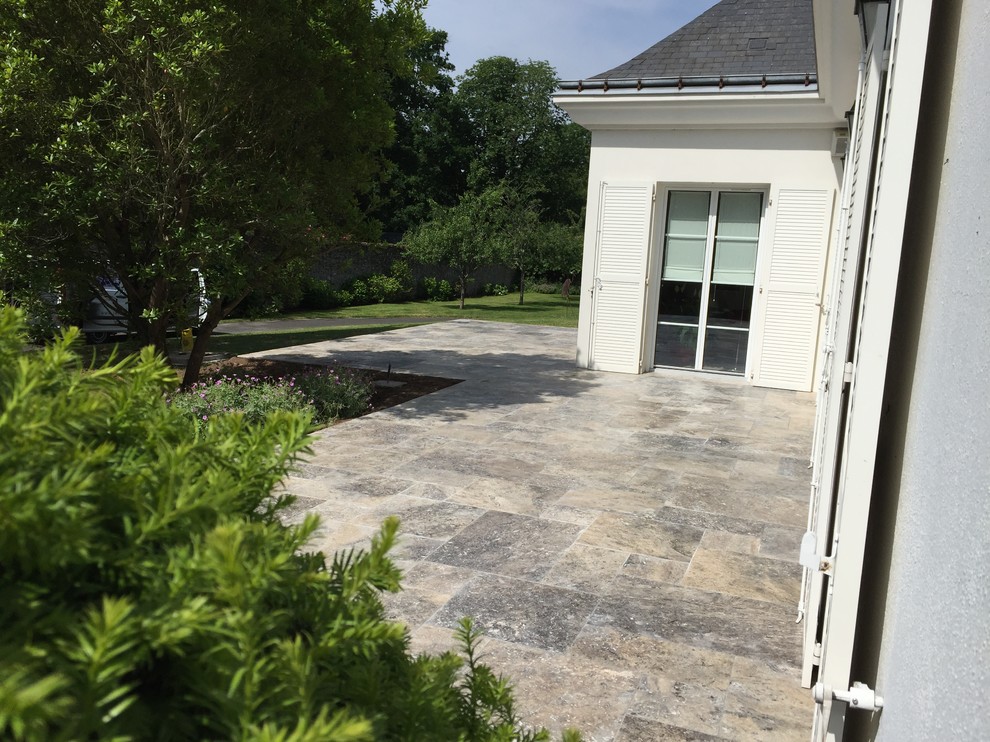 réalisation d'une terrasse pierre naturelle - Traditional - Patio ...