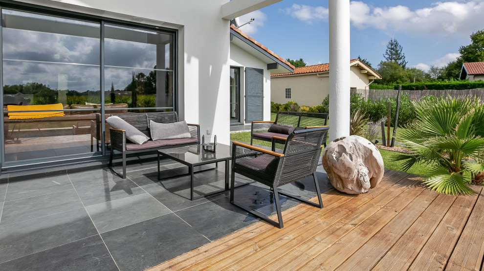 Terrasse en pierre naturelle ardoise Rio Black de Kei-Stone ...