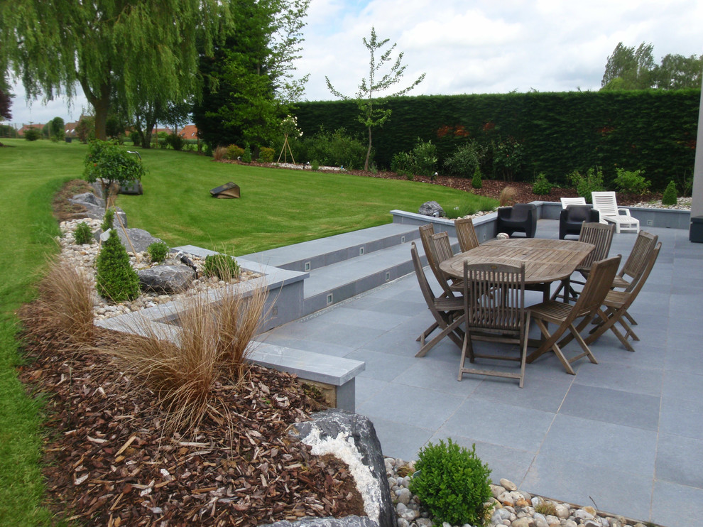Terrasse en pierres bleues - Contemporary - Patio - Lille - by Carnel ...