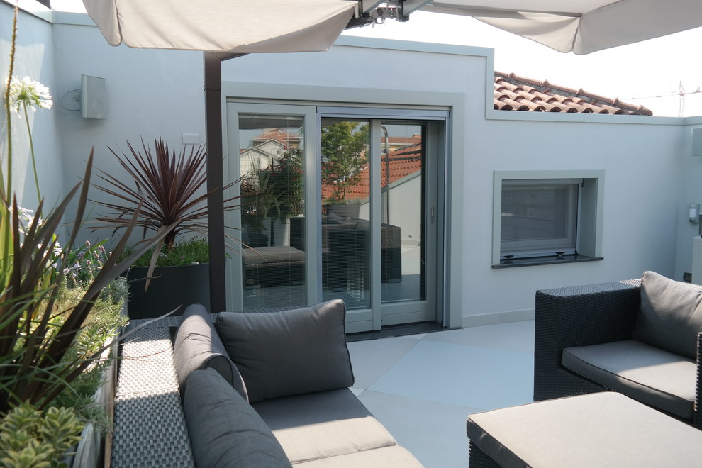 Un terrazzo tra tetti dal pigliocontemporaneo - Contemporain - Terrasse ...
