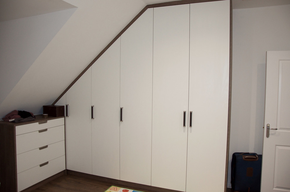 Sloping ceilings wardrobe with spray painted doors - Contemporary ...