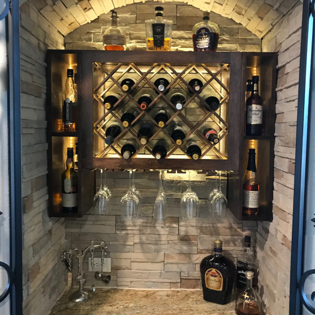 Custom Cabinets for wine and Liquor Bottles backlit with Ledge Stone ...