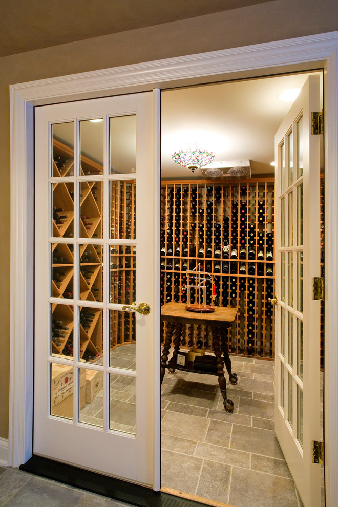 Wine Cellar with Porcelain Tile Floors and Fully Bound French Doors ...