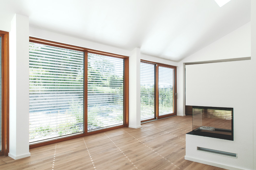 Neubau Einfamilienhaus mit Split-Level - Contemporary - Family Room ...